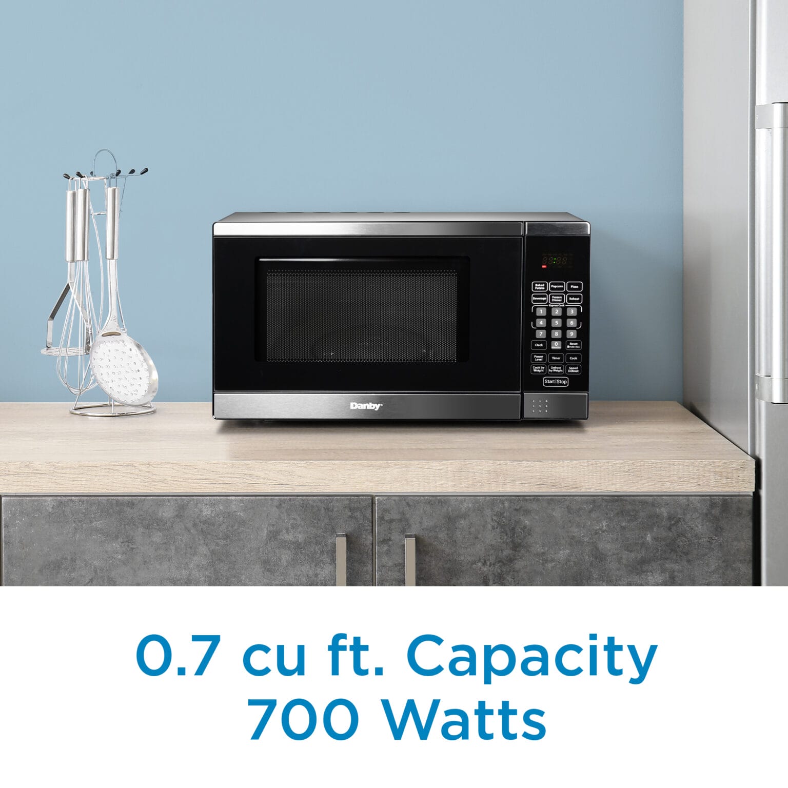 Danby Designer 0.7 cu. ft. Space Saving Under the Cupboard Microwave in ...